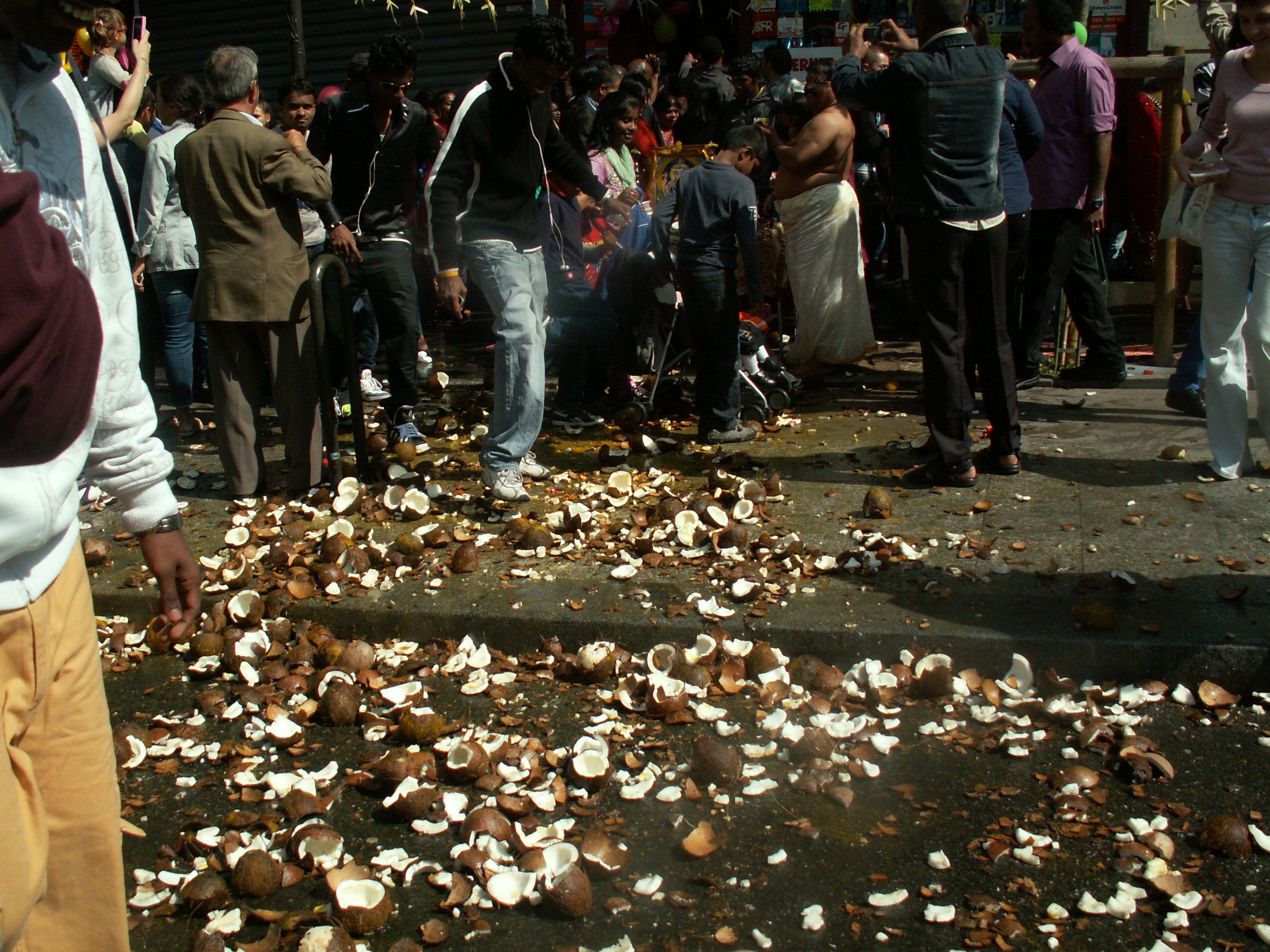 Smashing Coconuts to Honor Lord Ganesh